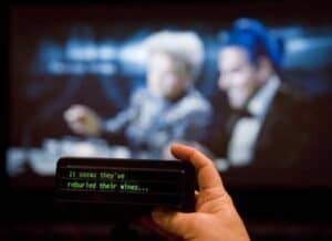 What is Closed Captioning in Movie Theatres & How It Works